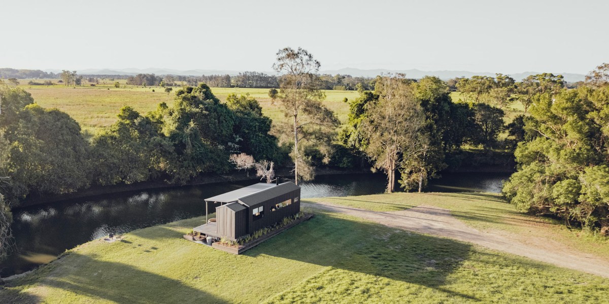 This new riverside cottage comes with an outdoor bath and sauna ...
